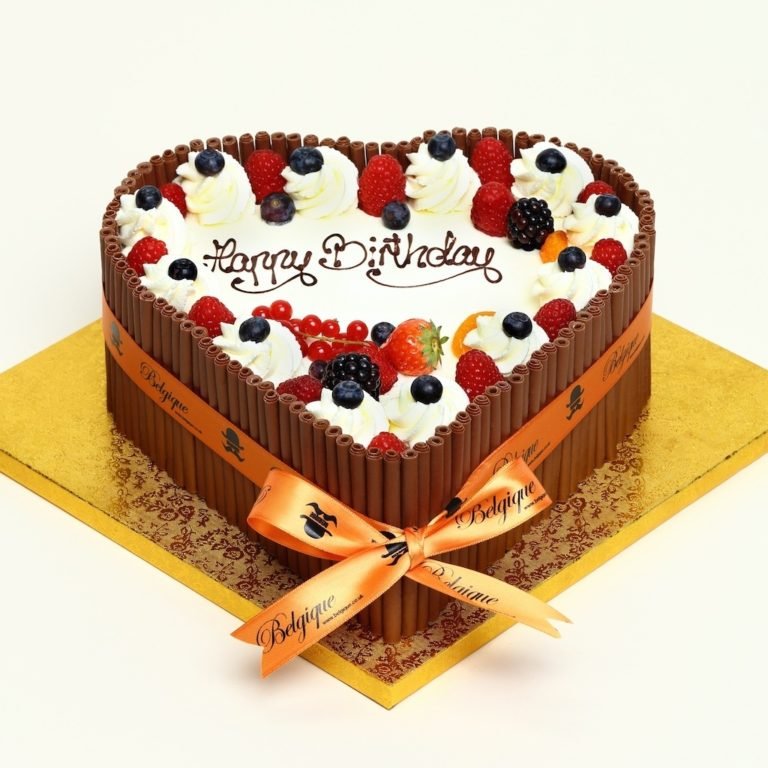 Heart-shaped Fresh Cream And Fresh Fruit Celebration Cake
